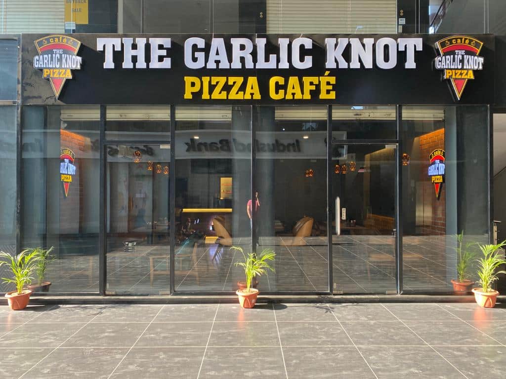 Book table and online reservation at The Garlic Knot, Adajan Gam, Surat