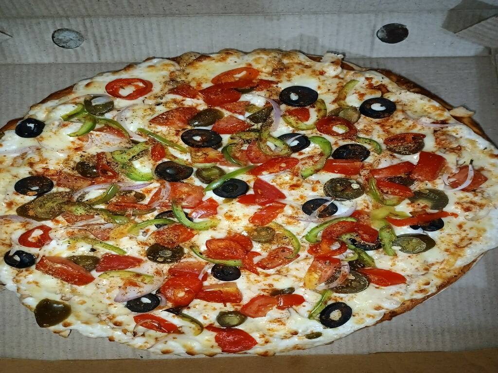 Famous Halal Pizza, Jasola, New Delhi | Zomato