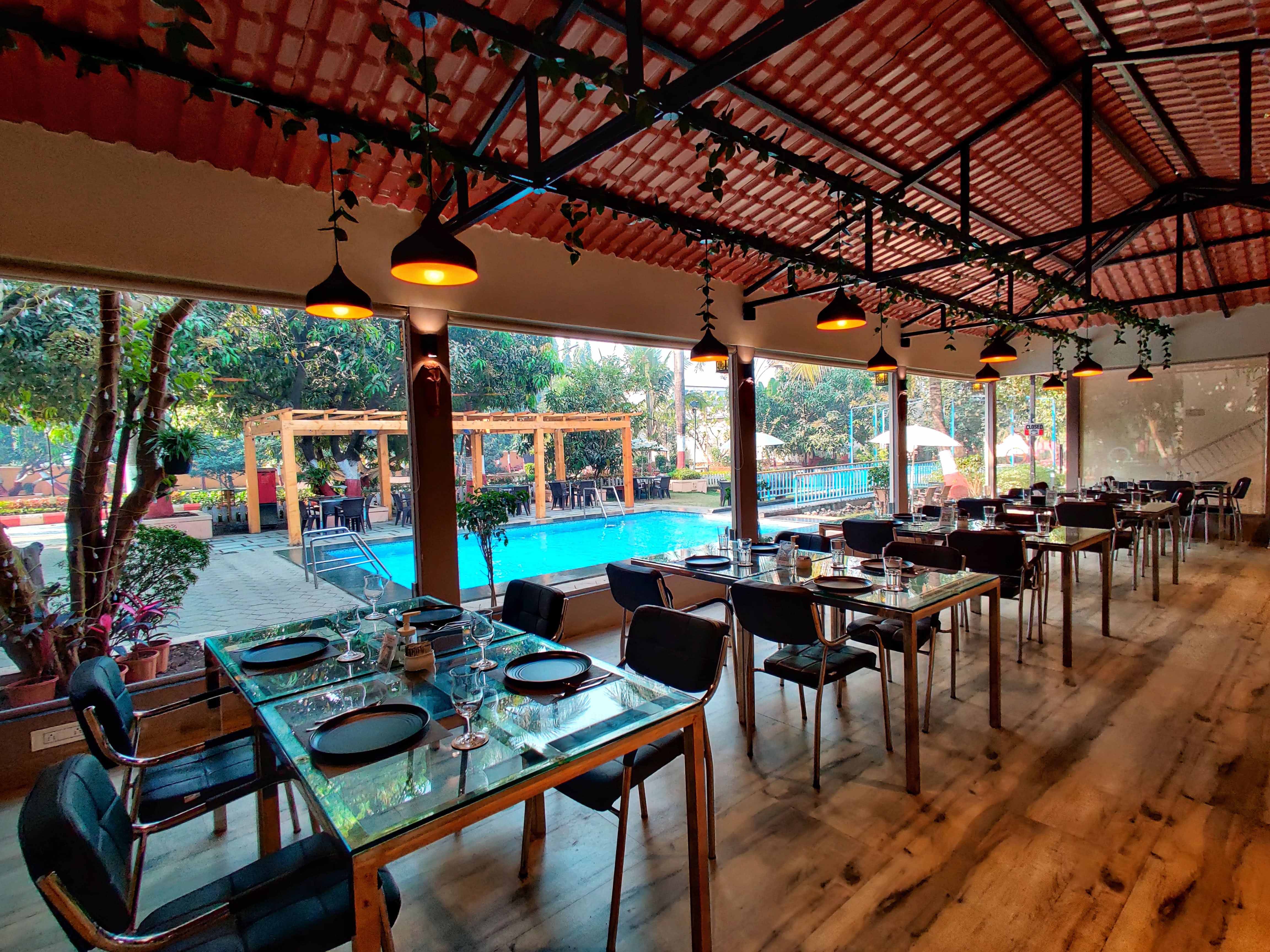 Book table and online reservation at The Poolside Restro, New Panvel ...