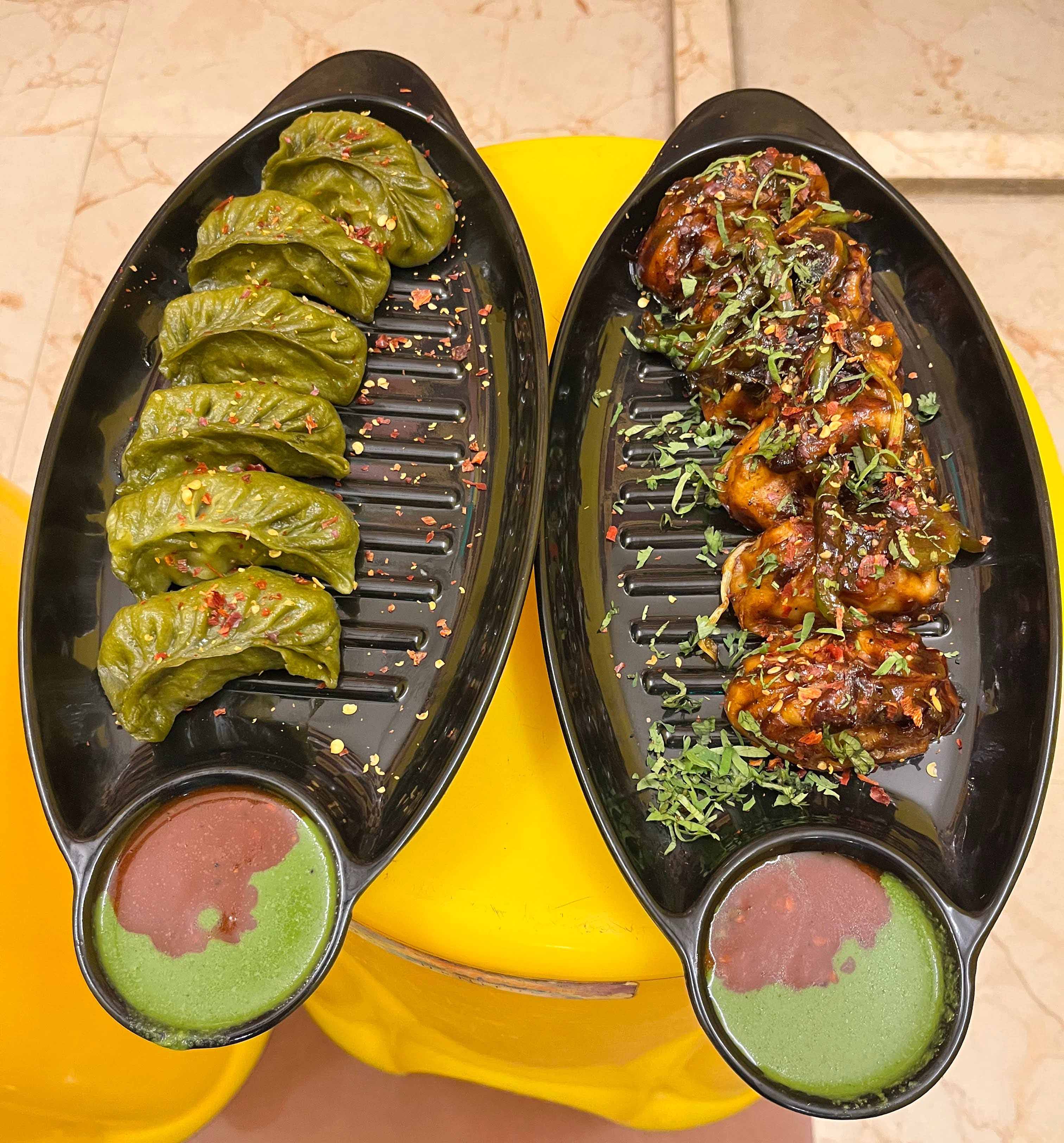 Book table and online reservation at Momo Tomo, Dum Dum, Kolkata